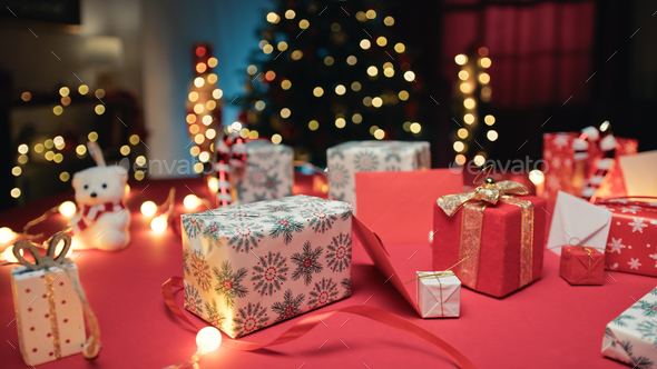 Table full of gifts and presents background Stock Photo by francescosgura