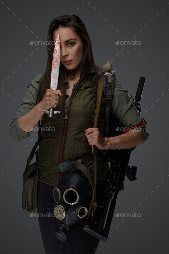 Middle eastern female survivor, dagger pose Stock Photo by fxquadro