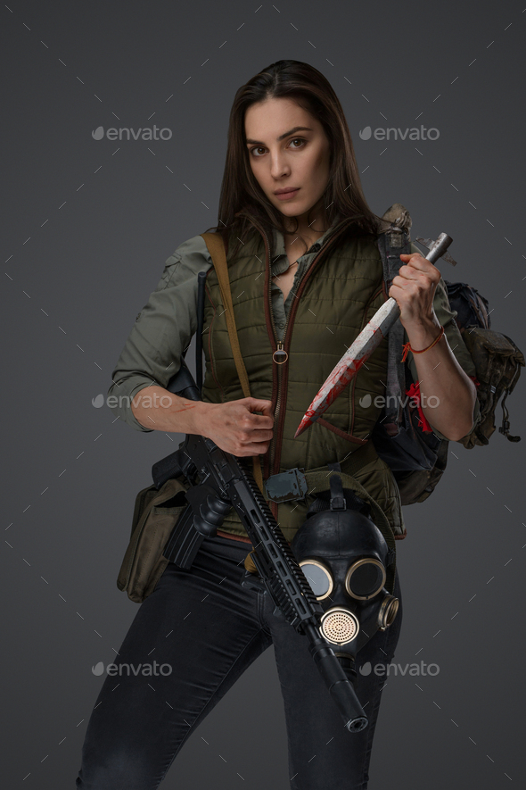 Middle eastern female survivor, dagger pose Stock Photo by fxquadro