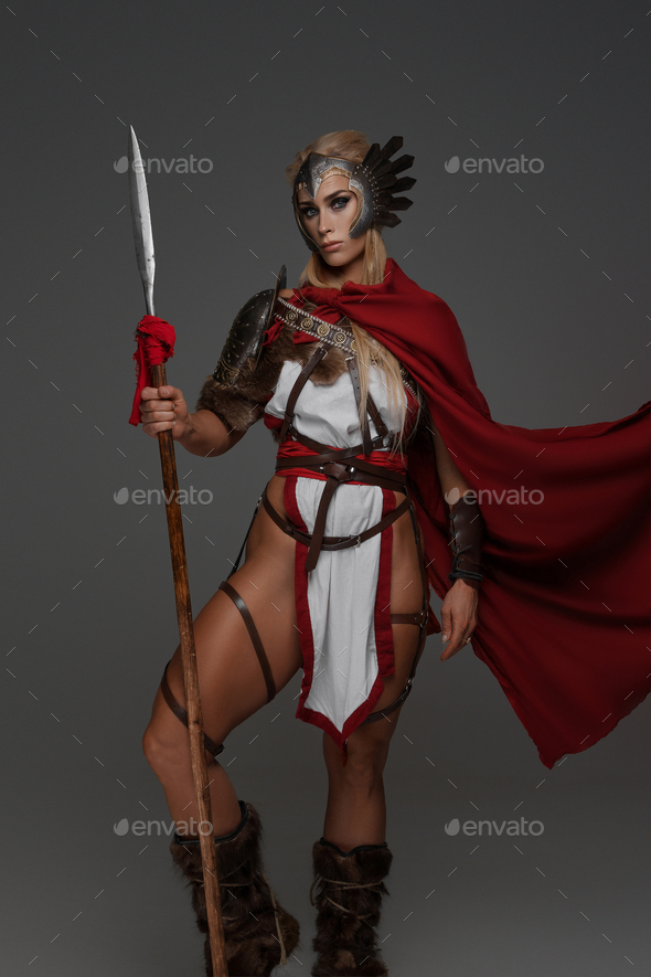 Blonde Viking Warrior: Fantasy Armor with Red Cloak Stock Photo by fxquadro