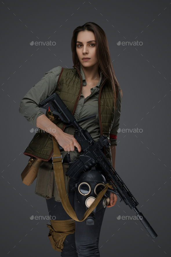 Middle Eastern Survivalist Woman with Rifle Stock Photo by fxquadro