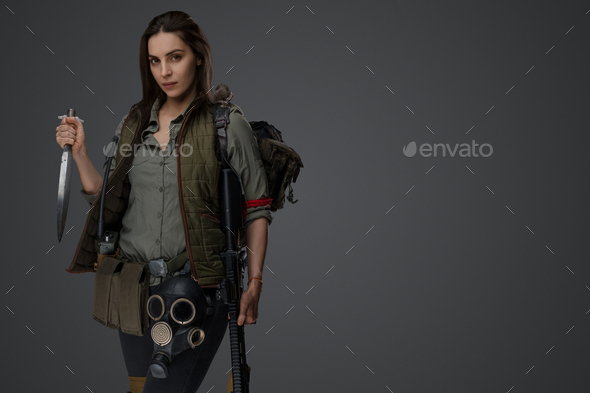 Middle eastern female survivor, dagger pose Stock Photo by fxquadro
