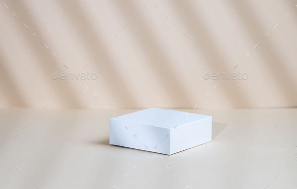 Abstract empty white box with shadows on a beige background. Stock ...