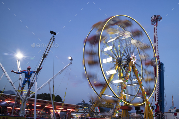 Inside an amusement park the colors of the Ferris wheel Stock Photo by ...