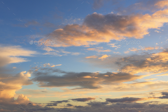 Glowing real sky at sunset texture background overlay. Dramatic red and ...