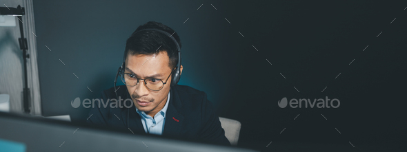 Call center employee talking with customer through headset, The ...