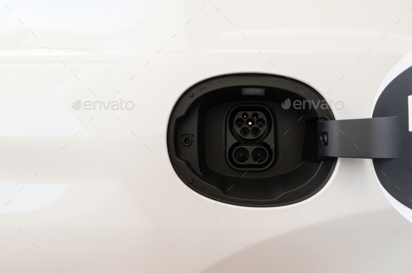 Type 2 CCS plug port on electric vehicle. DC - CCS type 2 EV charging ...