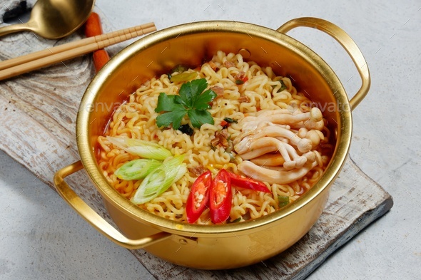 Serving a Korean style instant noodle, Ramyeon or Ramyun with spicy ...