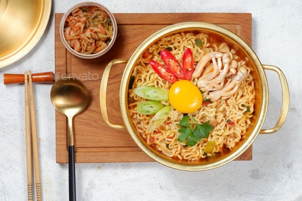 Serving a Korean style instant noodle, Ramyeon or Ramyun with spicy ...