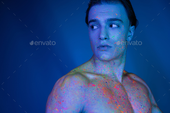 youthful, eye-catching and shirtless man with muscular body in radiant ...