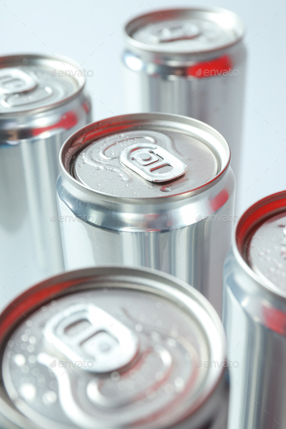 Close-up view of shiny tin cans for drinks Stock Photo by AtlasComposer