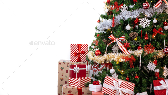 Beautiful gift boxes under a Christmas tree in home, adorned with Xmas ...