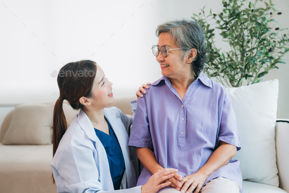 Medical staff taking and caregiver senior woman in Home. Healthcare and ...