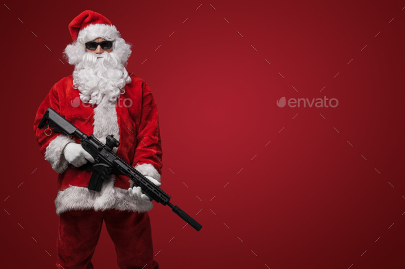 Santa Claus with Toy Machine Gun Stock Photo by fxquadro | PhotoDune