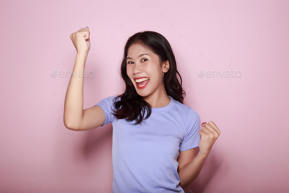 Asian woman doing cheerful pose, Portrait of a friendly young woman ...