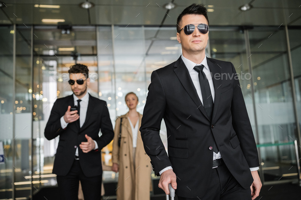 private security service, personal safety concept, handsome bodyguards ...