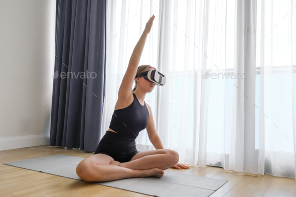 VR fit.Girl doing fitness in VR glasses at home,virtual reality ...