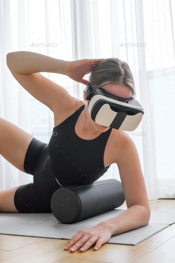 VR fit.Girl doing fitness in VR glasses at home,virtual reality exercise, immersive workout,VR ...