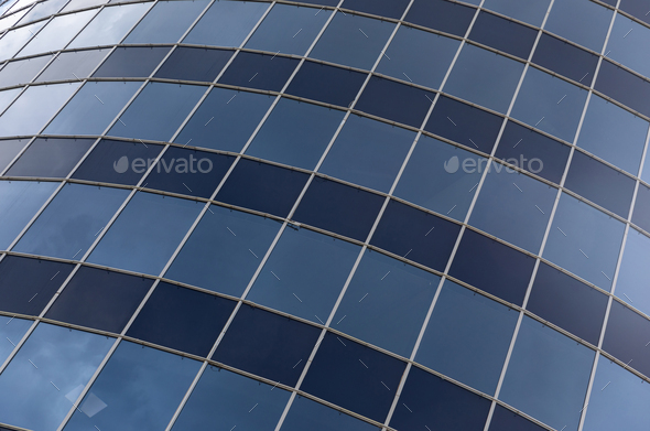 Blue and dark blue glass square and rectangular windows on building ...