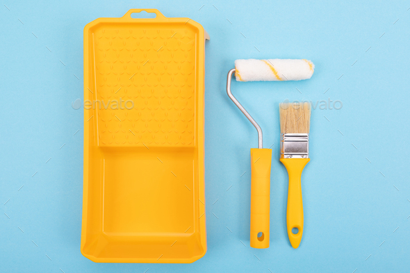 Paint tools. Paint brush and roller with tray for paint. Mock-up Stock ...