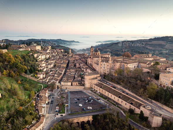 Aerial view of the medieval walled city on a mountain during the day ...