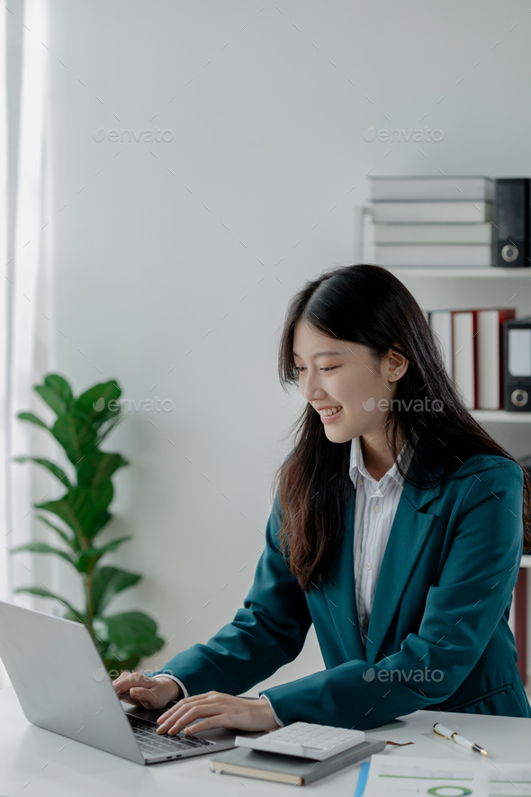 Accountant calculating numbers on calculator, Auditor is working on ...