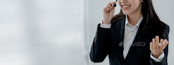 Call center employee talking with customer through headset, The ...