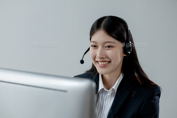 Call center employee talking with customer through headset, The ...