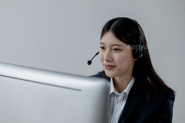 Call center employee talking with customer through headset, The ...