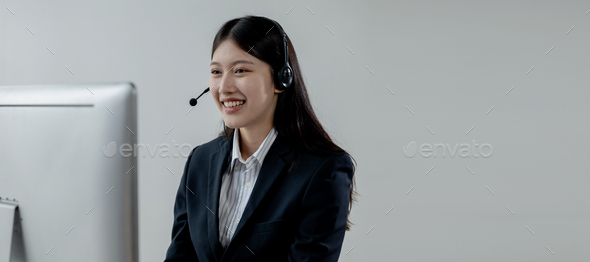 Call center employee talking with customer through headset, The ...