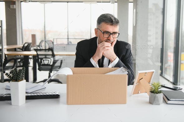 Pensioner mature retire from work carry staff back home. Lifestyle ...