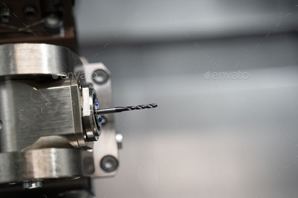 drilling driven tool in a CNC lathe Stock Photo by wirestock | PhotoDune