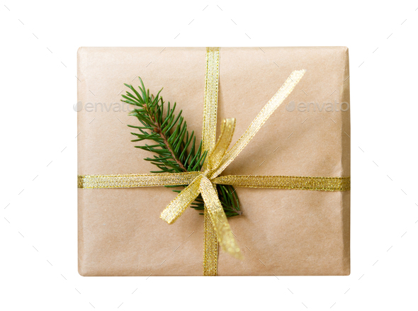 Gift boxes. Brown craft paper gift box with gold ribbon and Christmas ...