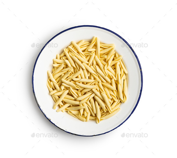 Fusilli pugliesi. Italian twisted pasta in plate isolated on white ...