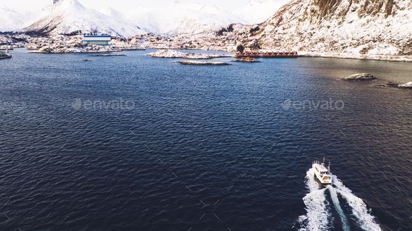 Aerial view of beautiful nordic environment with fjords ice and snow on ...