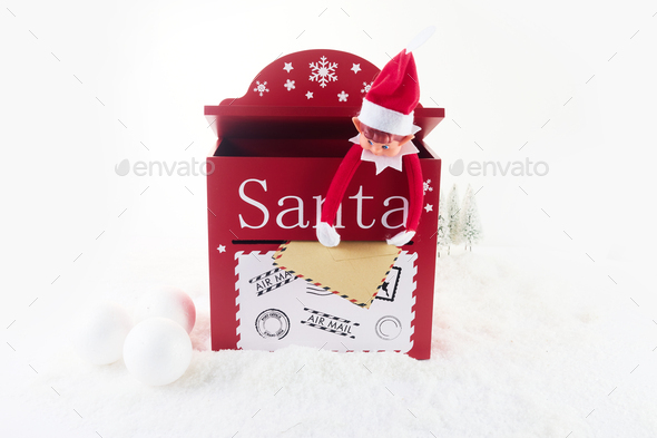 Red mailbox for Christmas mailings with letters to Santa Claus and Elf ...
