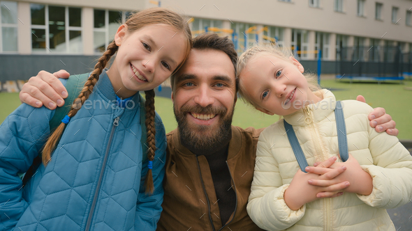 Close up happy family European man two girls kids father parent ...