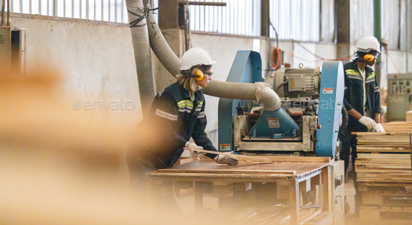 Woodworkers operate machines, tend lathes to cut, shape wood fixtures ...