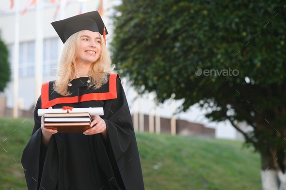 Happy graduation day for a young woman very beautiful with graduation ...