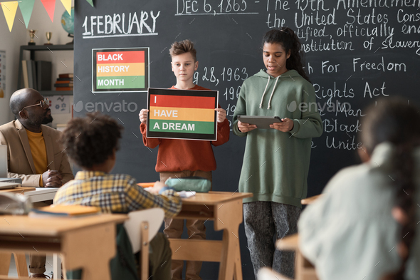 School children answering at lesson Stock Photo by Media_photos | PhotoDune