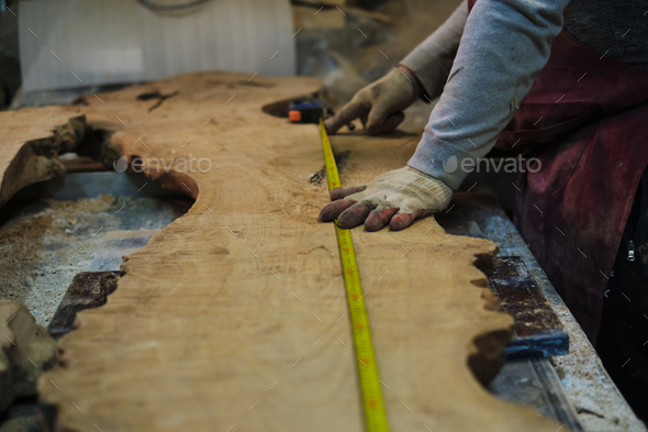 Marking out cuts on a wood slab, accuracy focused. Demonstrates the ...