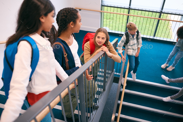 Group Of Secondary Or High School Pupils Inside School Building On ...