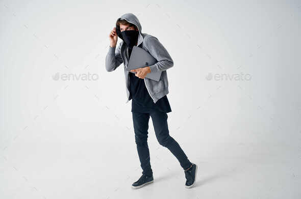masked man hooded head hacking technology security Lifestyle Stock Photo by shotprime