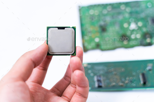 IC CPU in hand with PCB board background. Concept of Technology ...