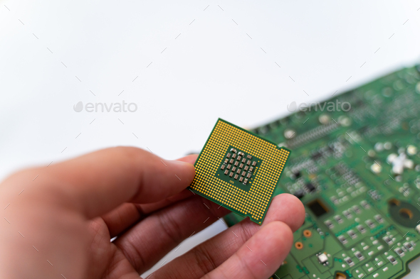 IC CPU in hand with PCB board background. Concept of Technology ...