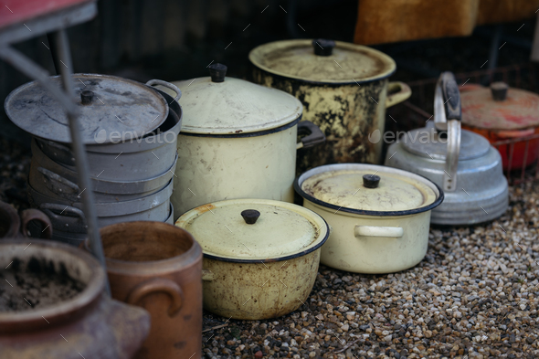 Collection of old rusty pots at street flea market. Stock Photo by ...
