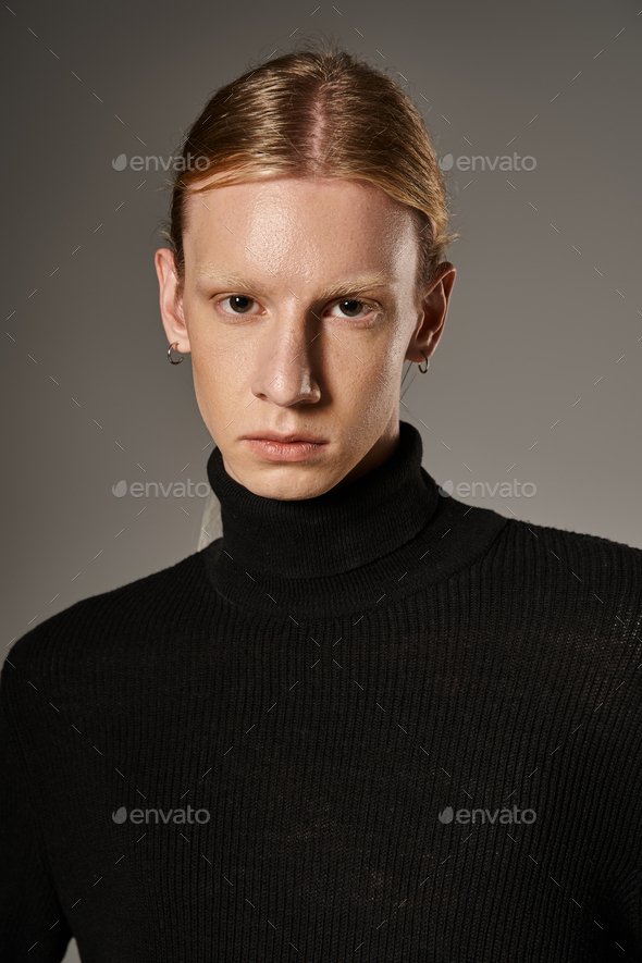 portrait of appealing red haired non binary person in black stylish ...