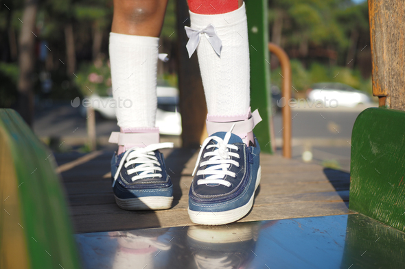 Child cerebral palsy disability, legs orthosis. Stock Photo by towfiqu98