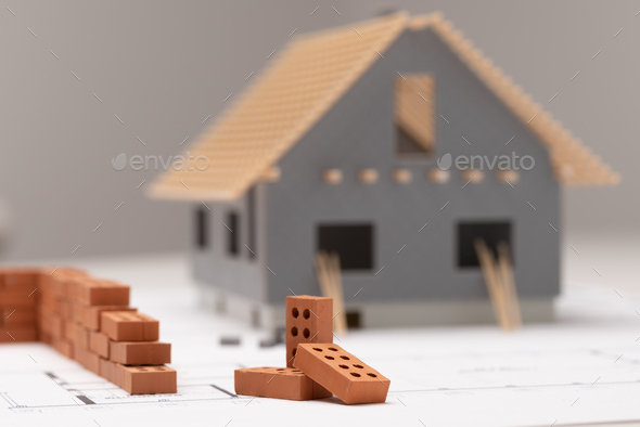 Bauhaus - project with bricks and building plan Stock Photo by Pasanheco