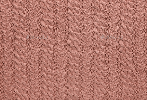Texture of smooth knitted sweater with pattern. Peach Fuzz colour of ...